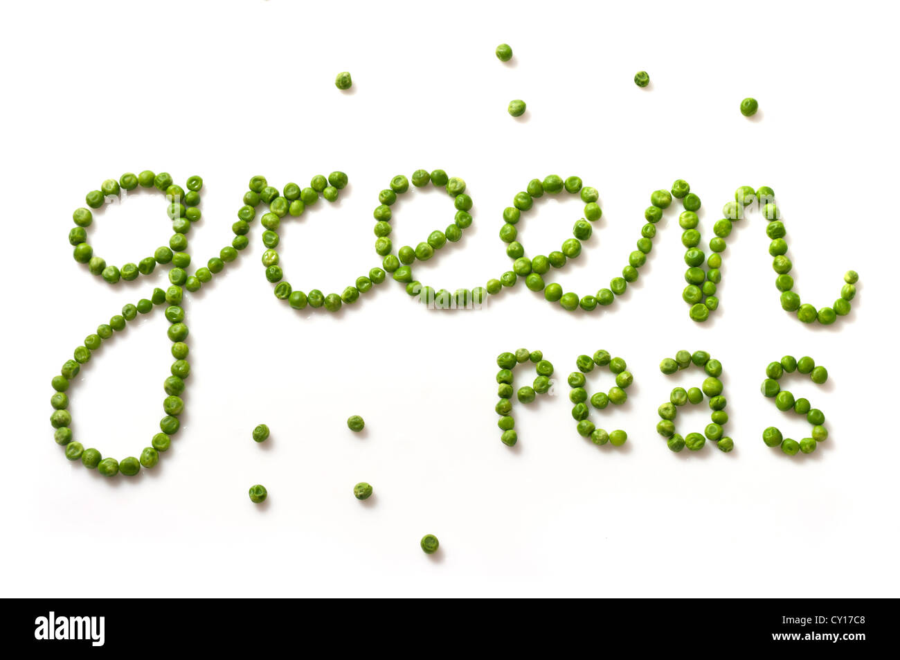 The word GREEN PEAS made of green peas freshed with water drops, studio ...