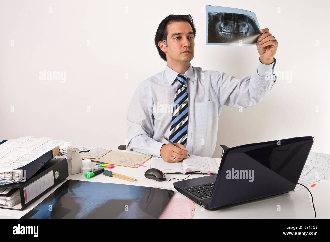 Professional clinical research monitor at working place Stock Photo - Alamy