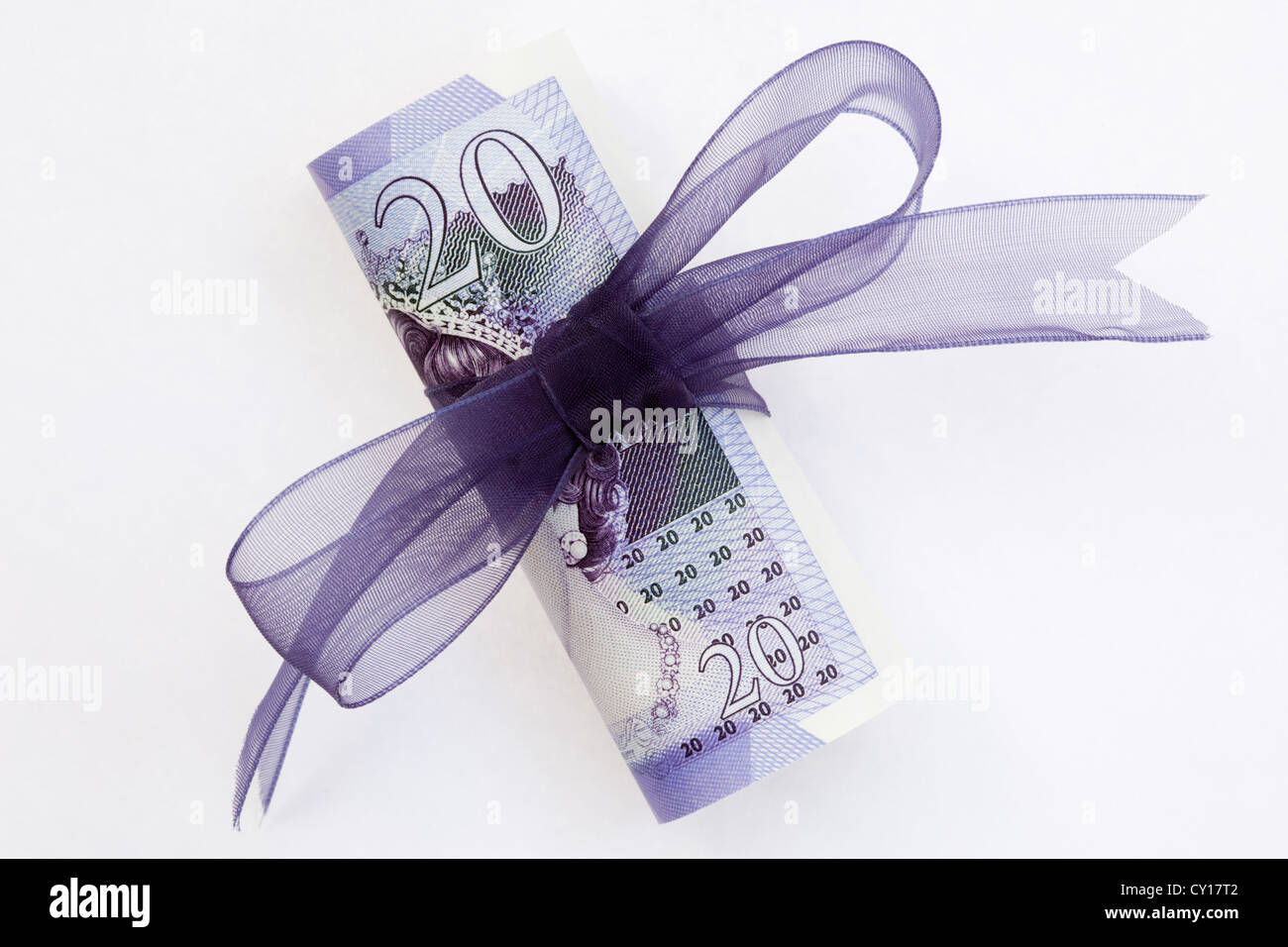 Rolled bank note uk hi-res stock photography and images - Alamy