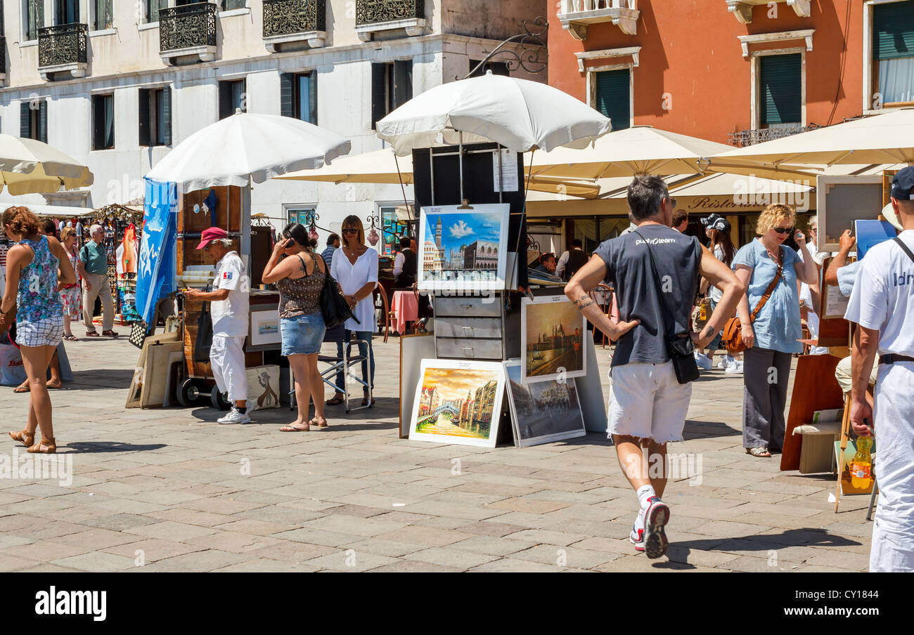 16. July 2012 - Street vendor selling tourist souvenirs. Most vendors in Venice aren't of ...