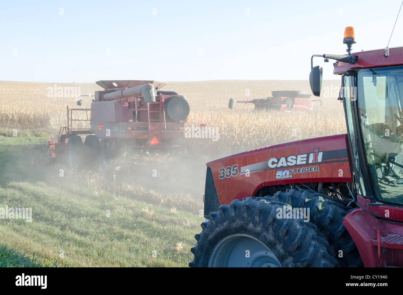 Two Tractors Harvesting American Field Stock Photo - Alamy