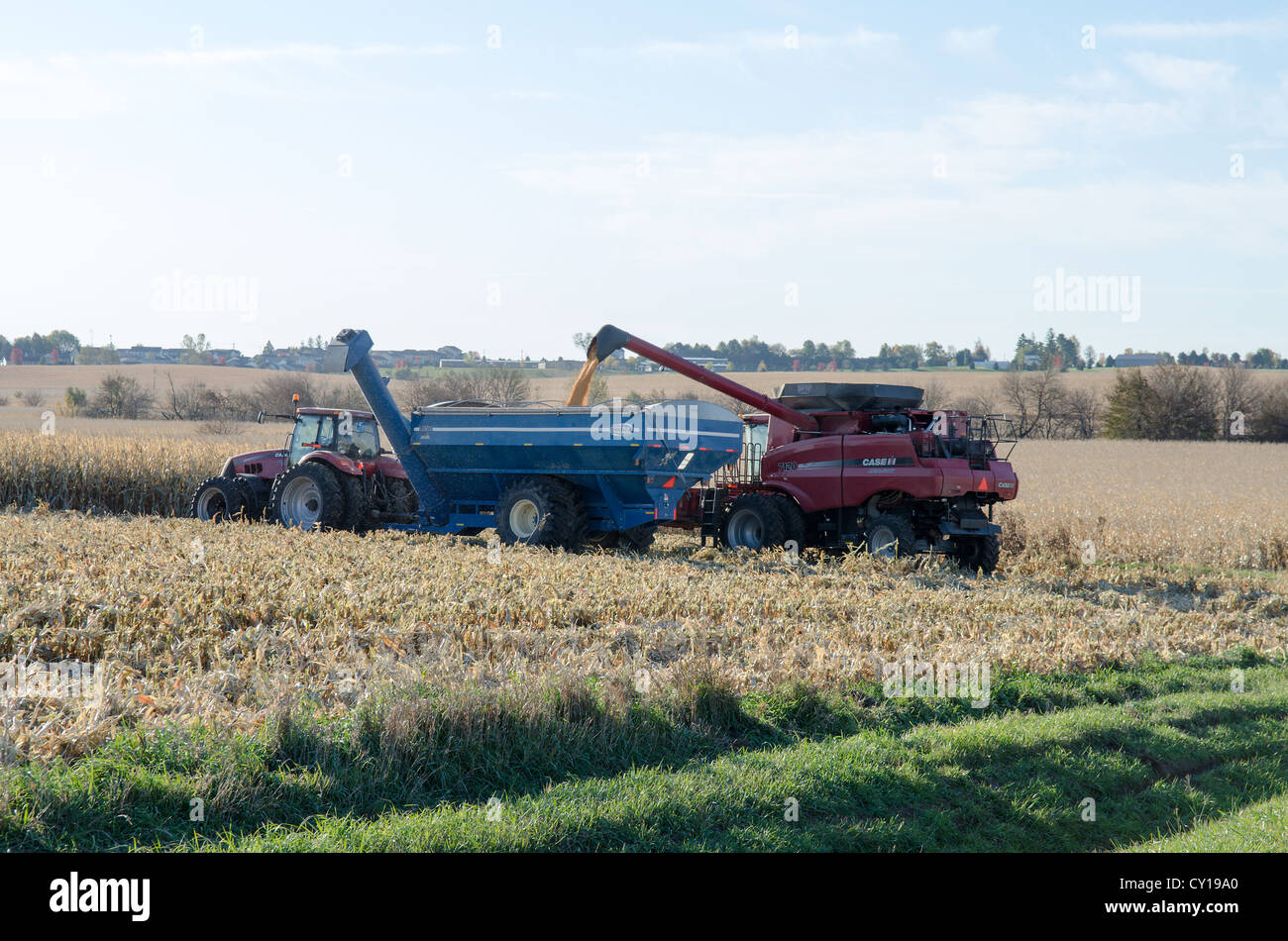 Two Tractors Harvesting American Field Stock Photo - Alamy