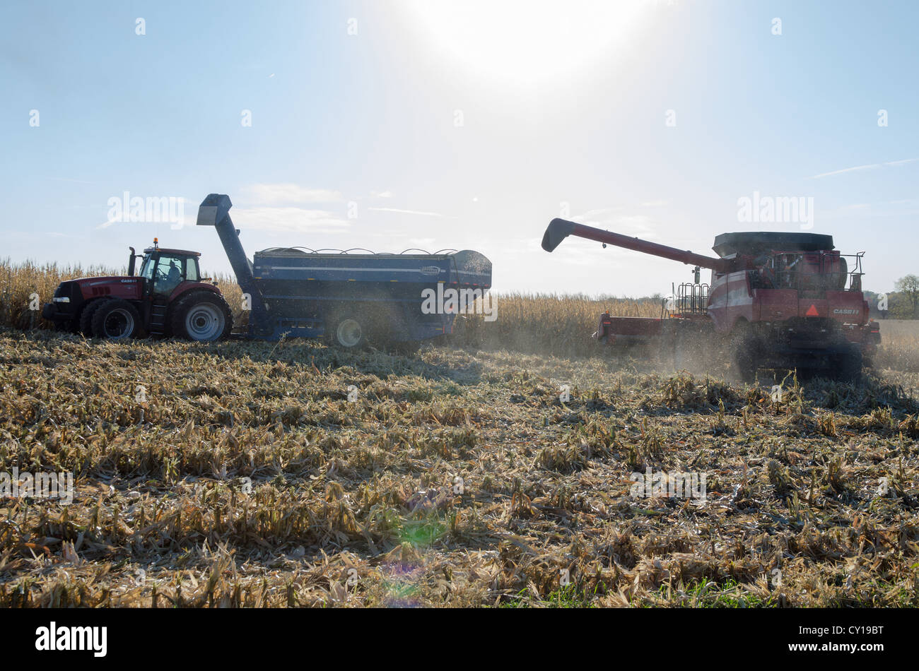Two Tractors Harvesting American Field Stock Photo - Alamy