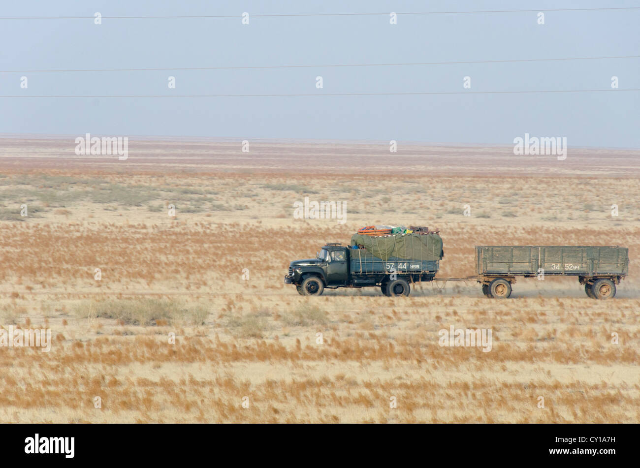 Truck and trailer crossing gobi desert hi-res stock photography and ...