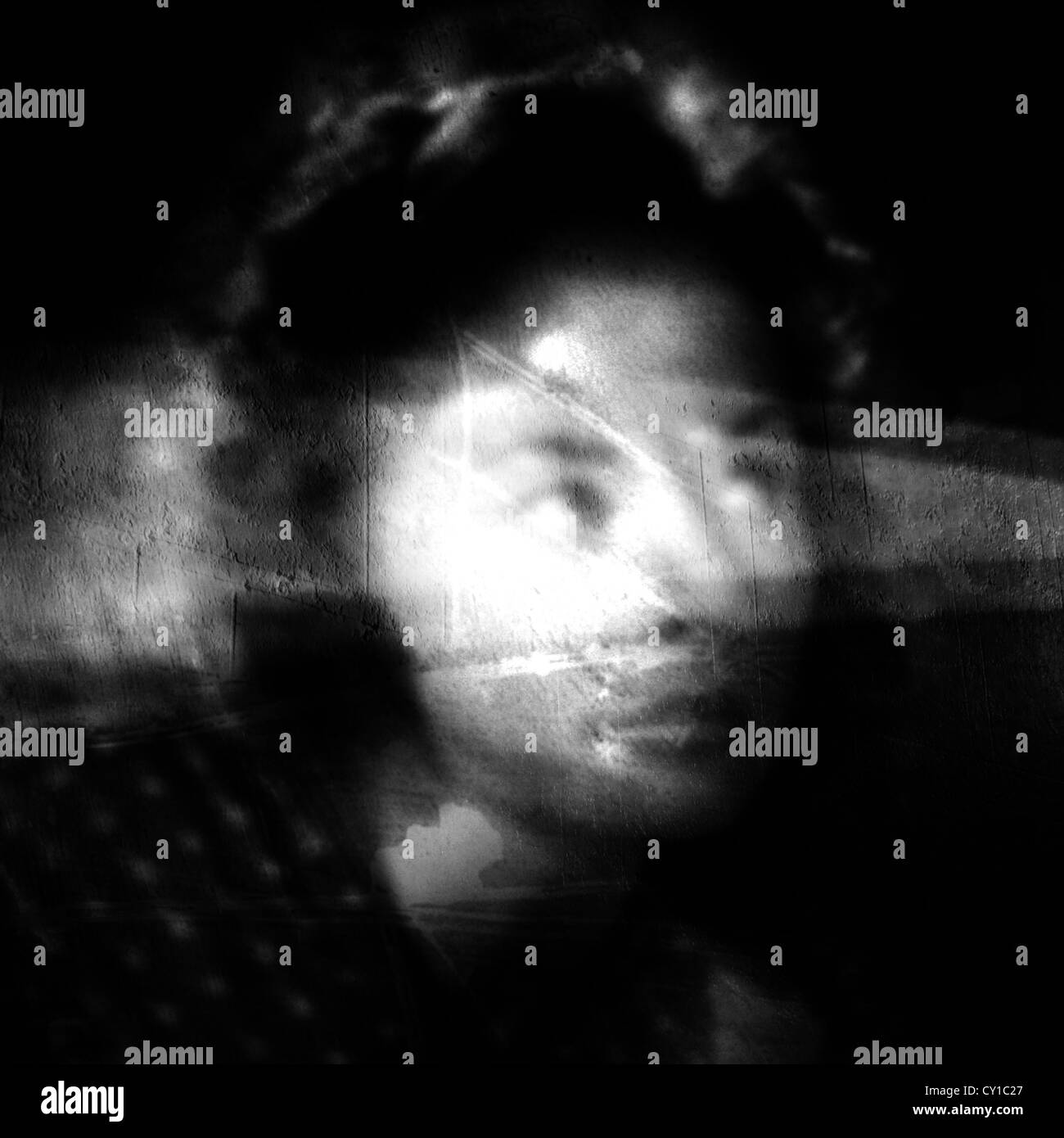 woman with light cast across her eyes Stock Photo - Alamy