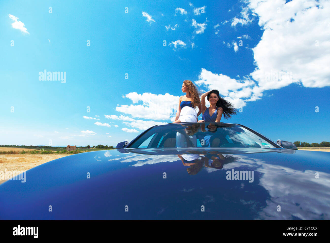 women dance in car Stock Photo - Alamy