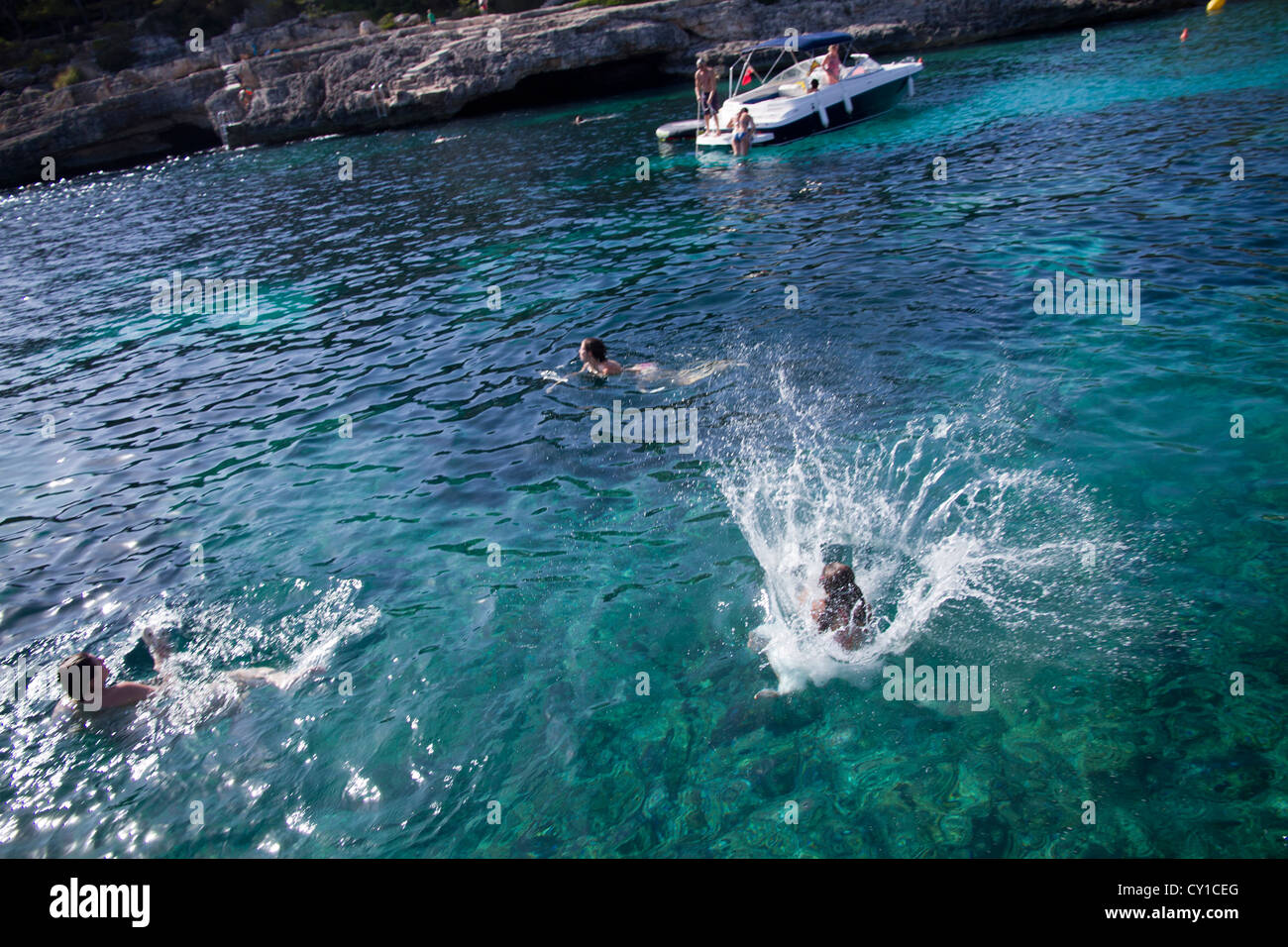 person splashing sea water Stock Photo - Alamy
