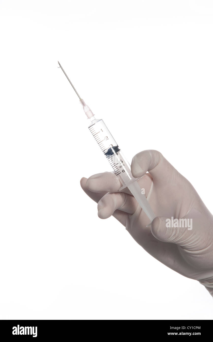 Isolated hand syringe vaccination Cut Out Stock Images & Pictures - Alamy