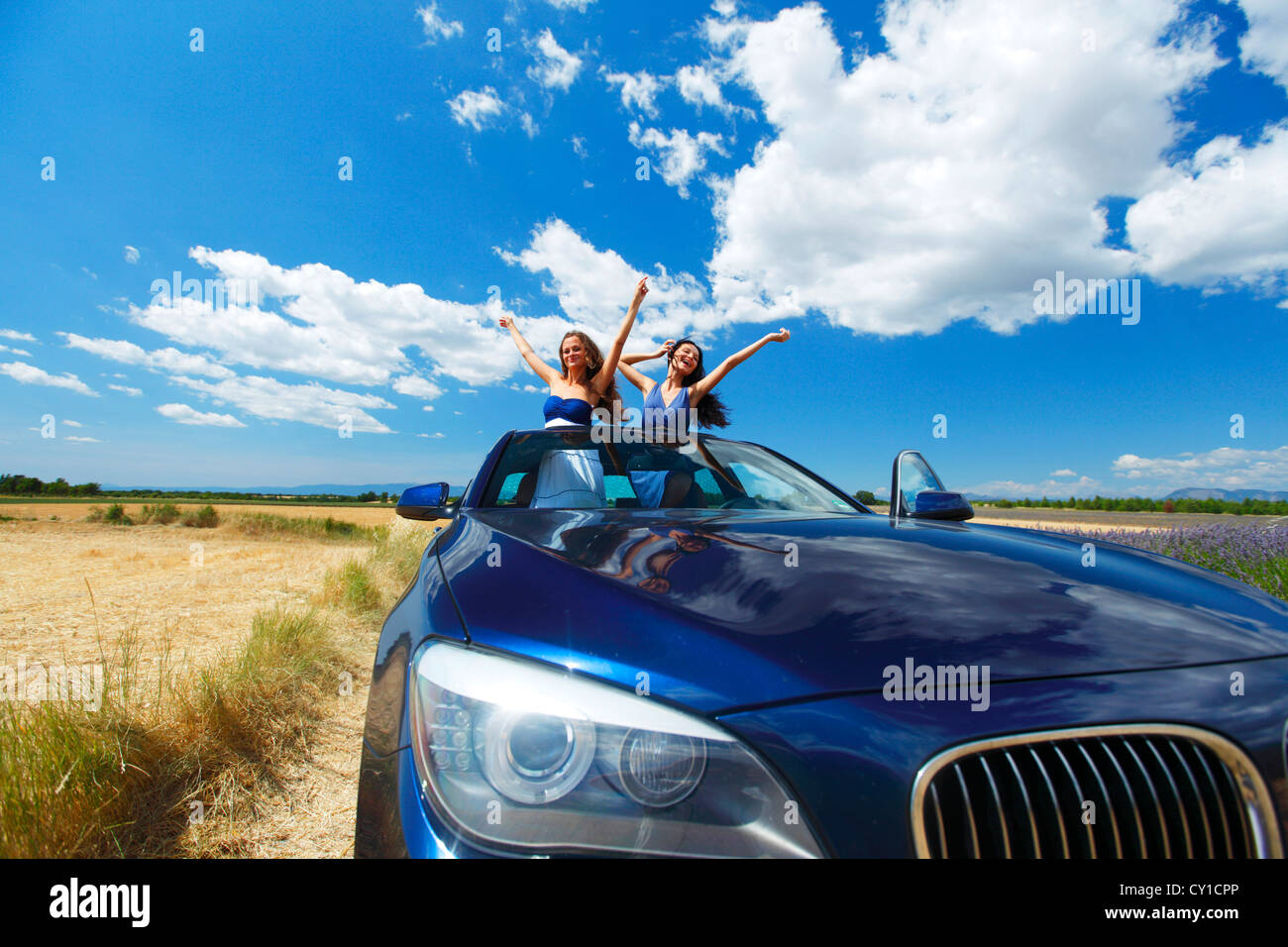 women dance in car Stock Photo - Alamy
