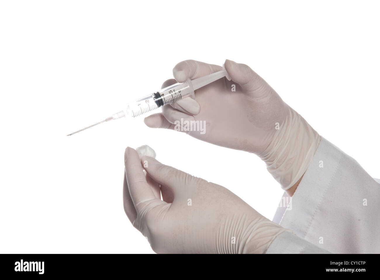 Hand holding syringe, on white background Stock Photo - Alamy