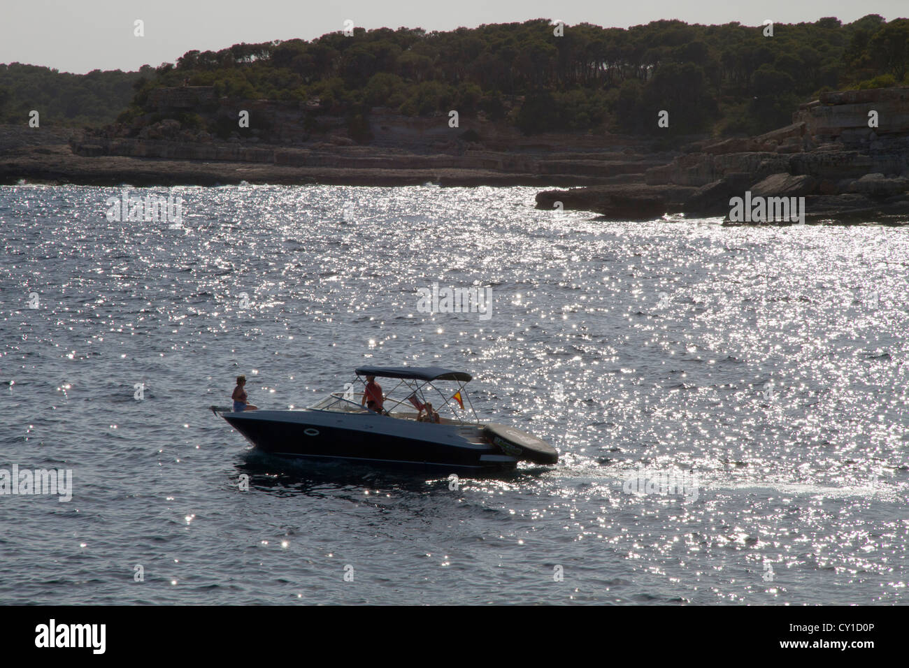 motor boat riding on sea water Stock Photo - Alamy