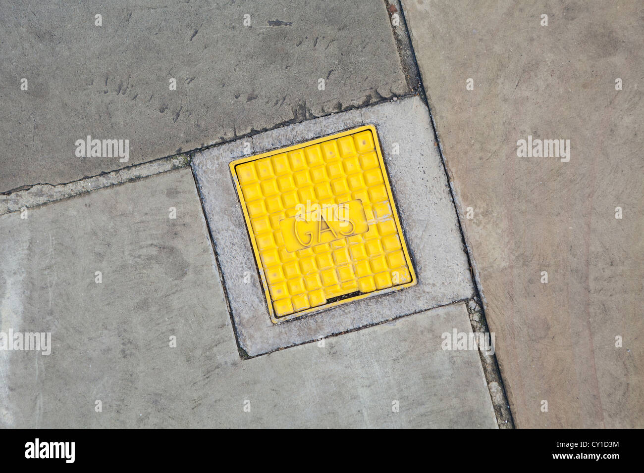 Gas manhole cover in pavement, UK Stock Photo - Alamy