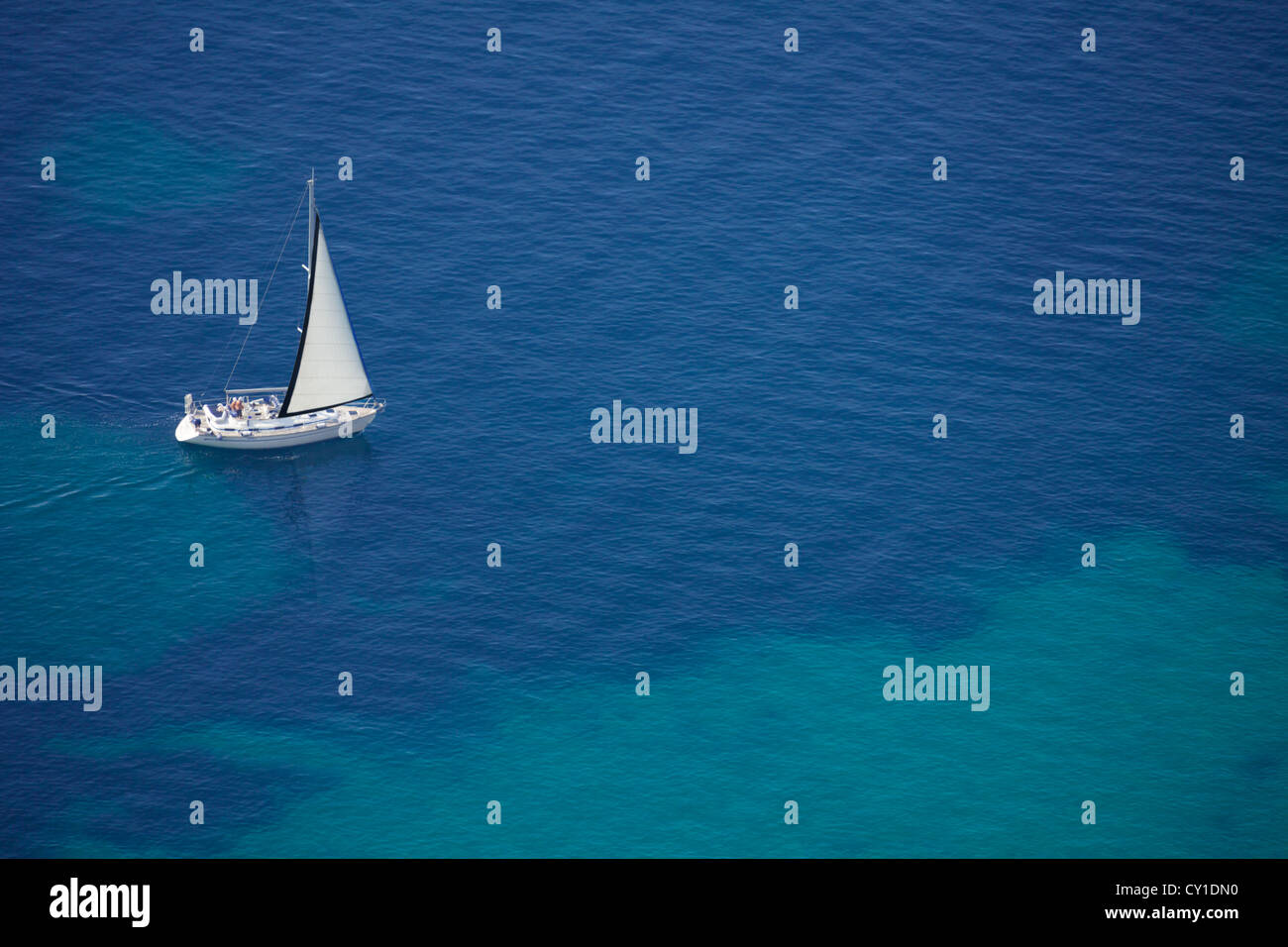 yacht with white sail from high angle view Stock Photo - Alamy