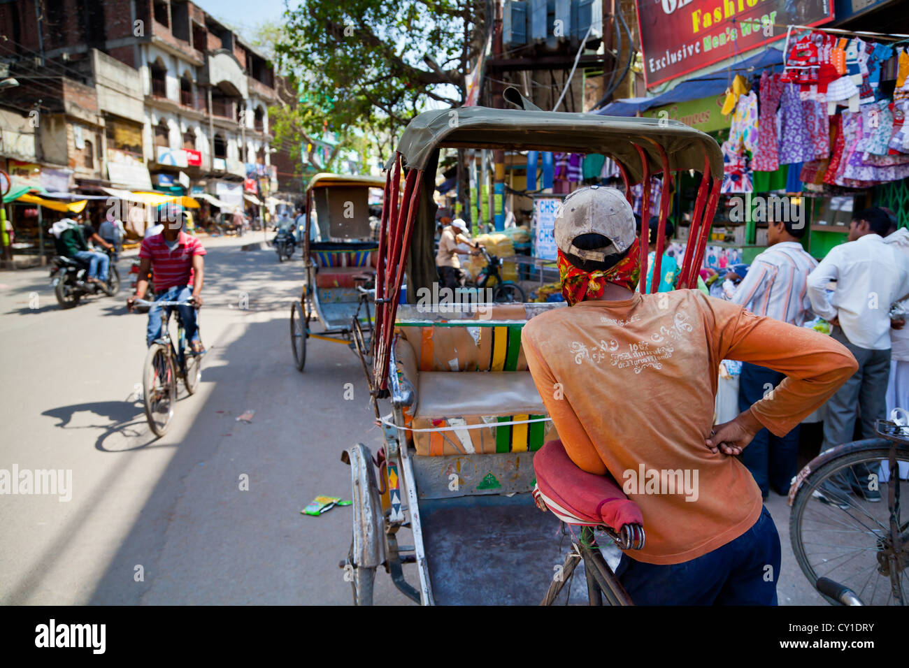 Rickshaw Driver waiting for Passengers in Varanasi, India Stock Photo ...