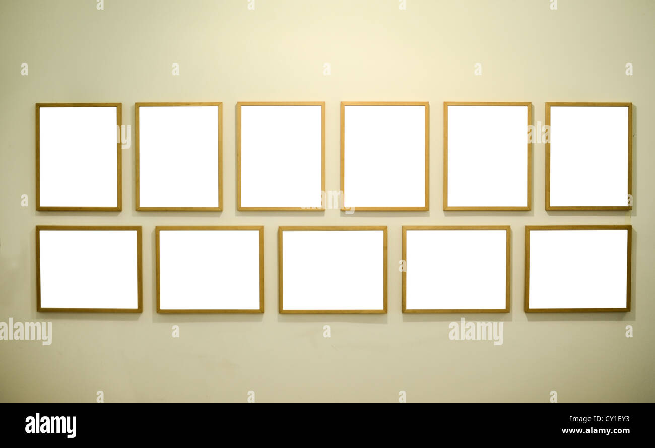 Empty picture frames on gallery wall Stock Photo - Alamy