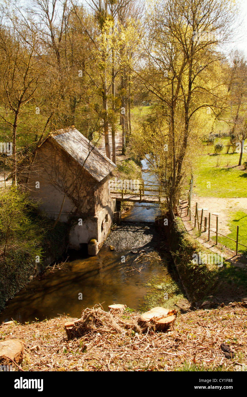 Cottage by stream, France Stock Photo - Alamy