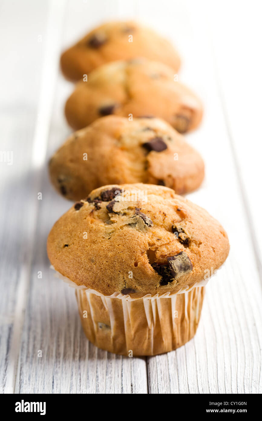 tasty muffin with chocolate on kitchen tabel Stock Photo - Alamy