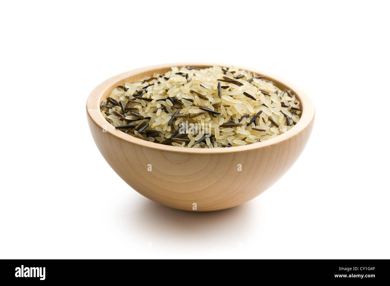 wild rice in wooden bowl on white background Stock Photo - Alamy