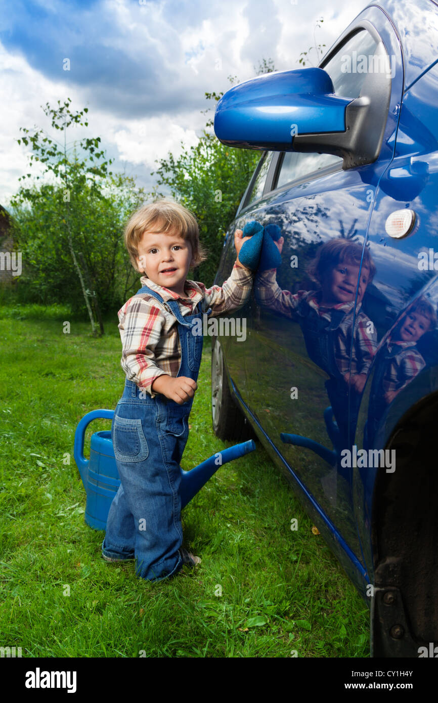 little boy helping his parents to wash car Stock Photo - Alamy