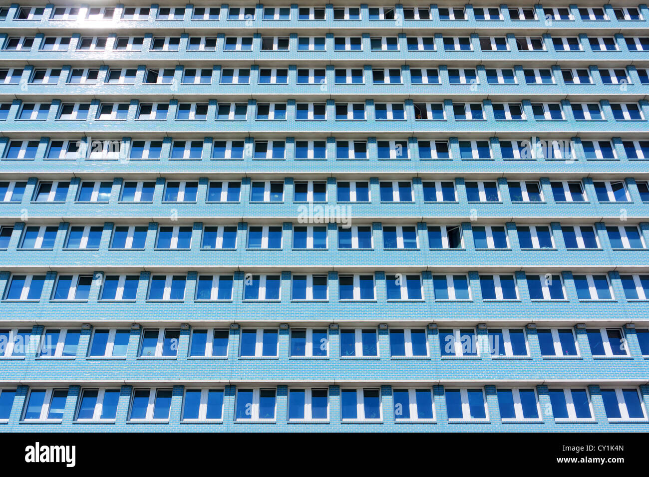 Former socialist GDR (DDR) architecture in East Berlin. Blue building ...