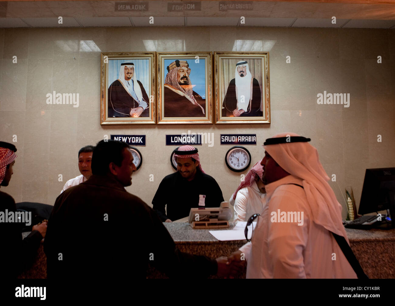 Hotel Reception With The Rulers Portraits, Saudi Arabia Stock Photo - Alamy