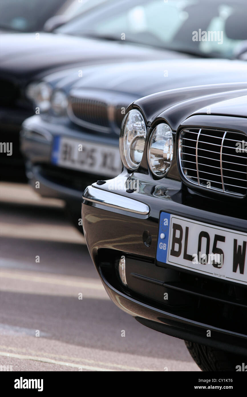 Executive cars on forecourt Stock Photo - Alamy