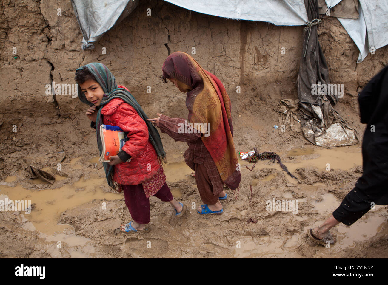 path muslim boots poverty winter kabul refugee cam Stock Photo - Alamy