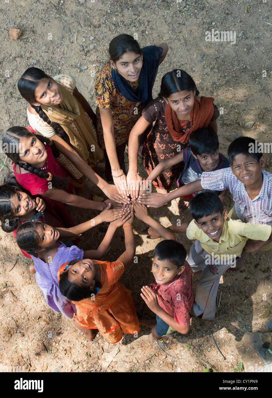 Indian childrens hands in a circle. India Stock Photo - Alamy