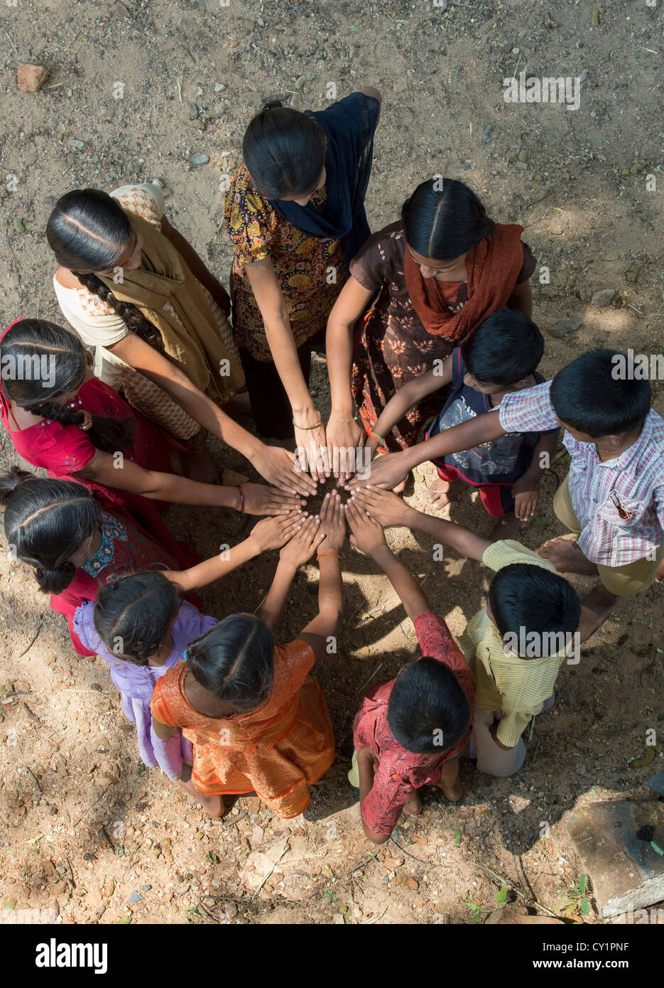 Indian childrens hands in a circle. India Stock Photo - Alamy