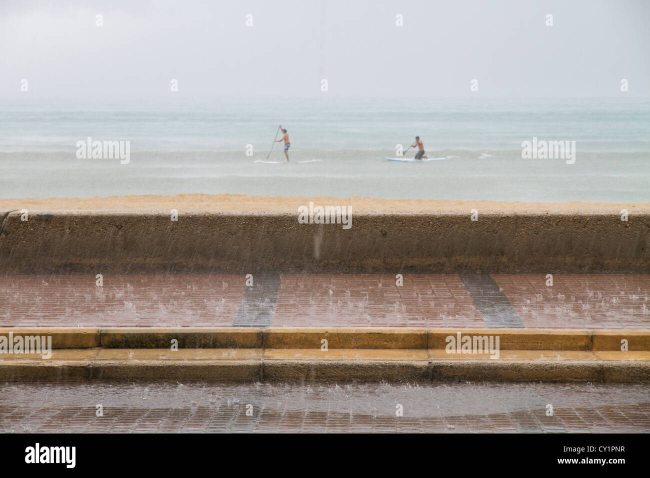 rain raining on seaside promenade Stock Photo - Alamy