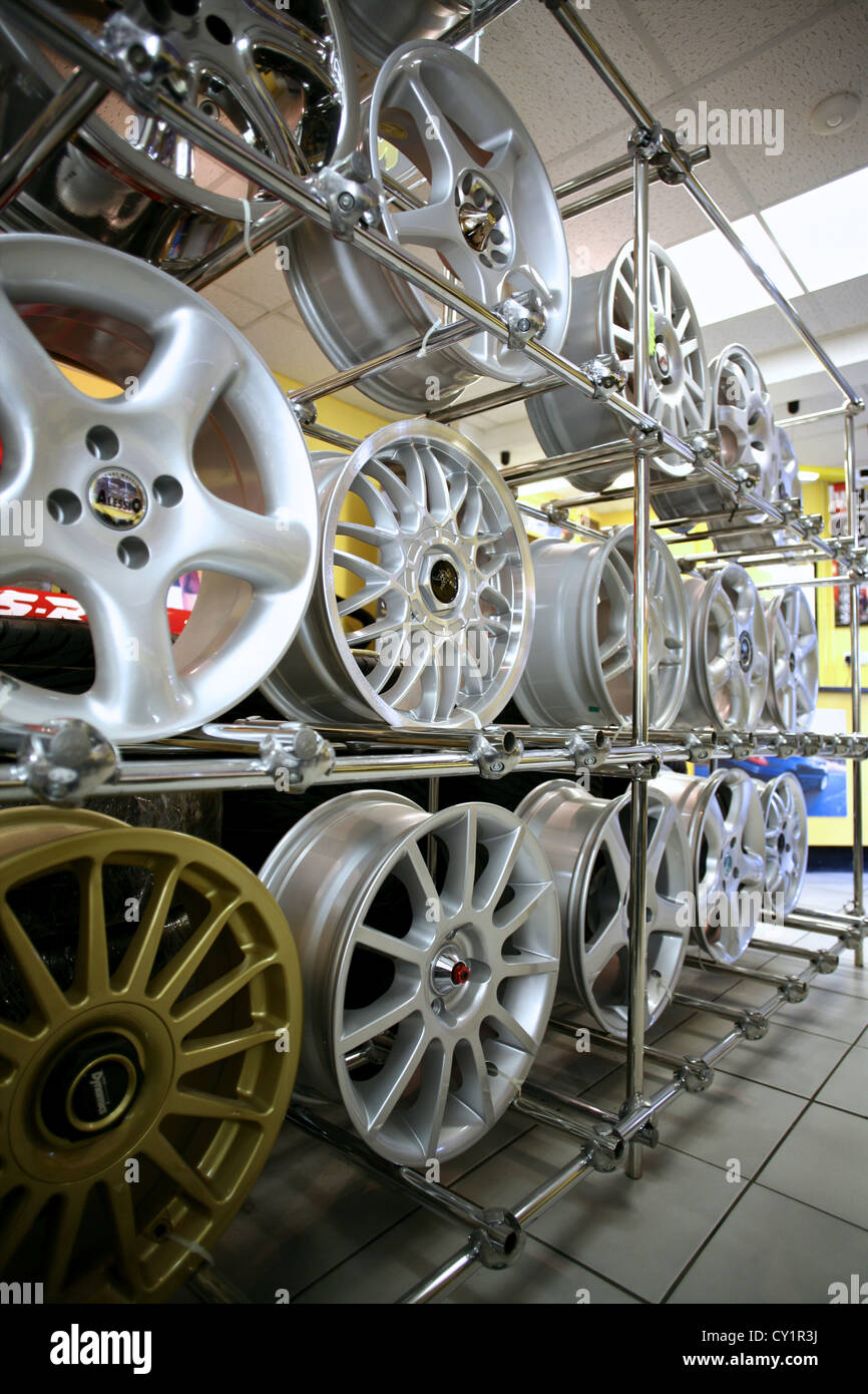 Alloy wheels on display in shop Stock Photo - Alamy