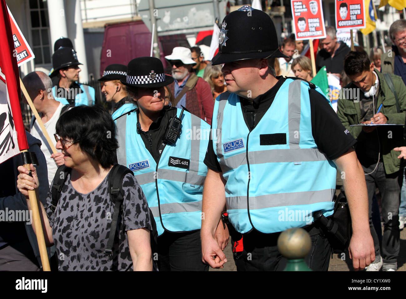 Police liaison officers wearing new light blue high-vis jackets and ...