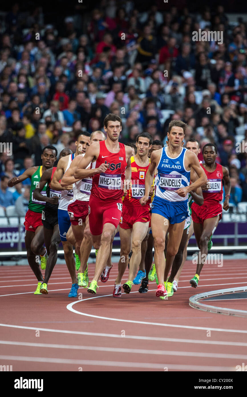 Andrew Wheating (USA) leads the pack competing in the men's 1500m first ...