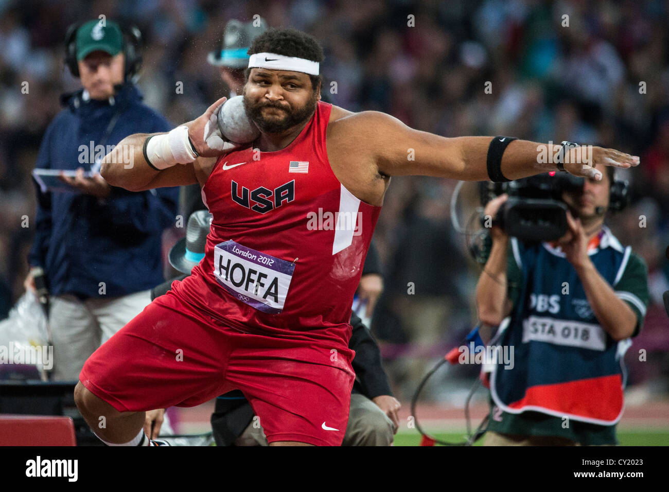 Reese Hoffa (USA) competing in the men's shot put at the Olympic Summer ...