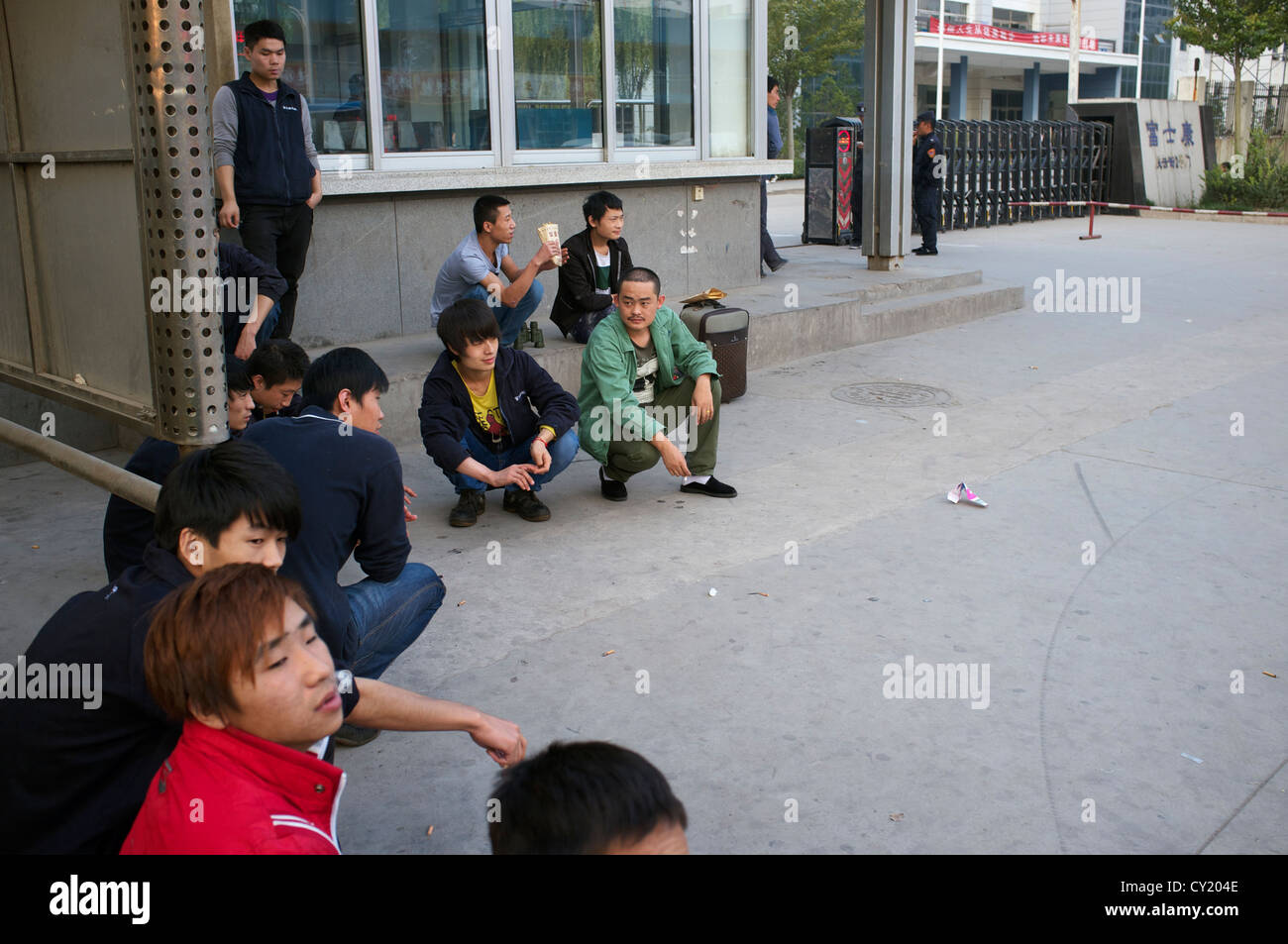 Workers of foxconn have a break at the factory hi-res stock photography ...