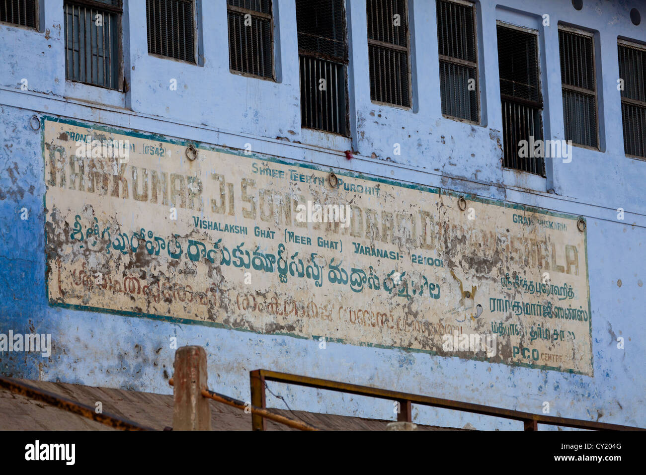 Advertisement Signs on a Wall at the Ghats in Varanasi, India Stock ...