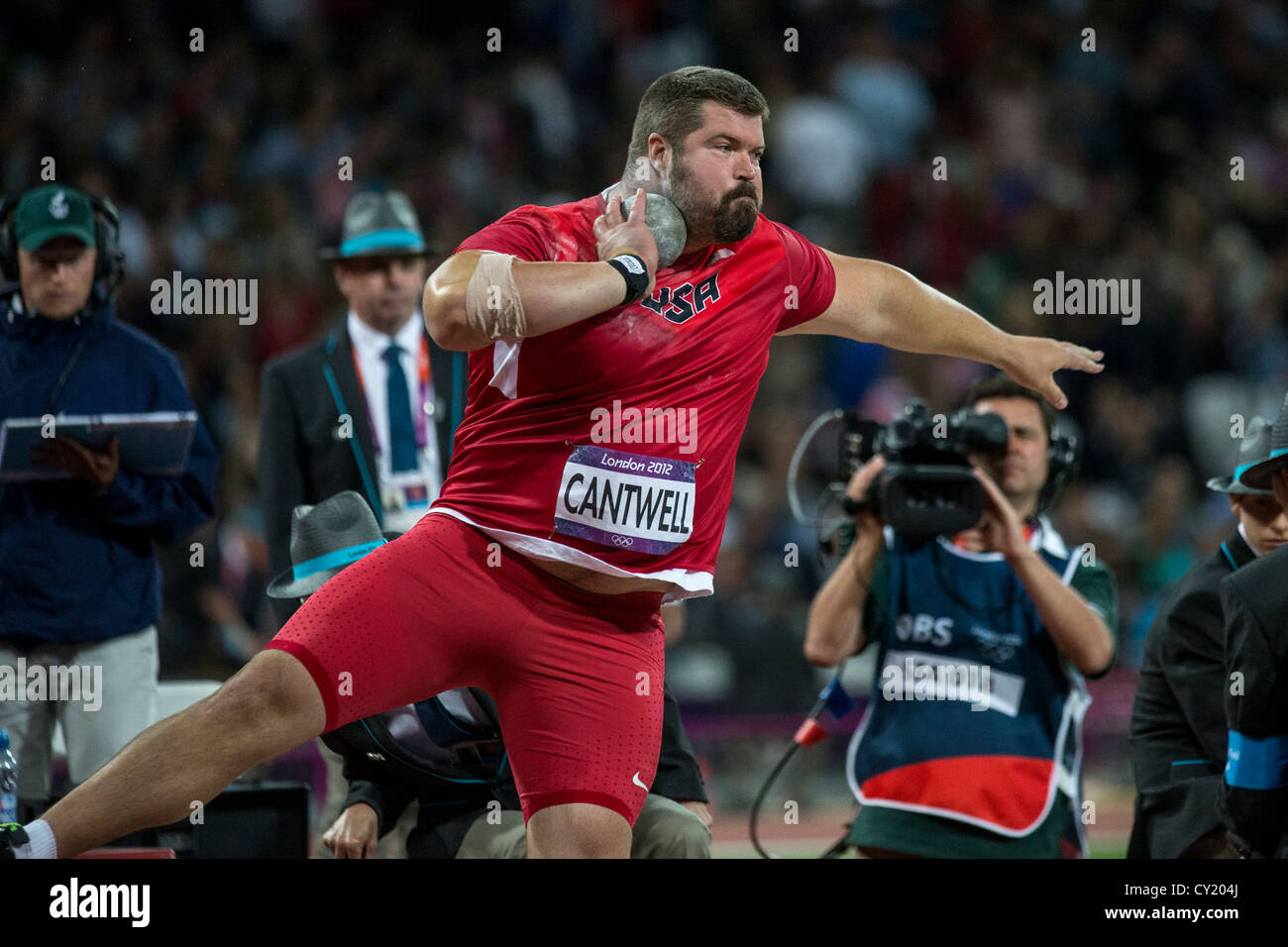 Christian Cantwell (USA) competing in the men's shot put at the Olympic ...