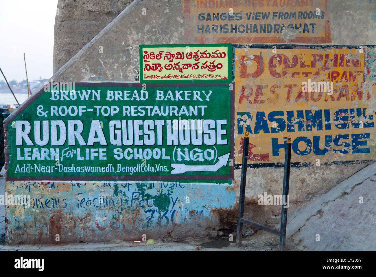 Advertisement Signs on a Wall at the Ghats in Varanasi, India Stock ...