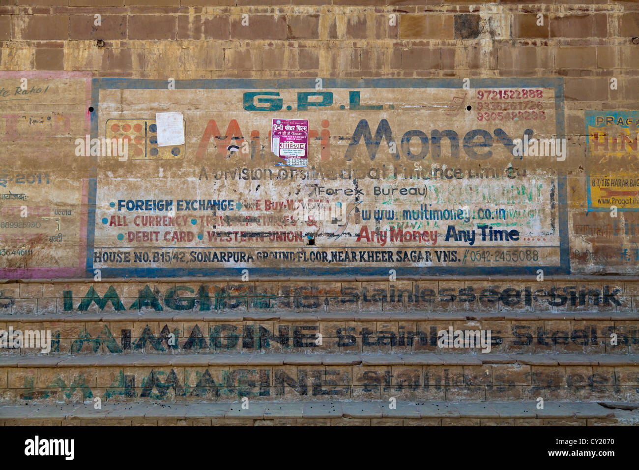 Advertisement Signs on a Wall at the Ghats in Varanasi, India Stock ...