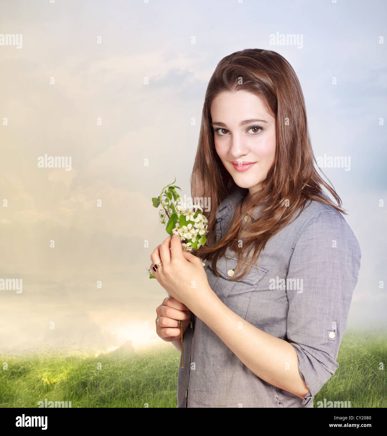 Beautiful Young Woman Holding White Flowers Stock Photo - Alamy Beautiful Young Woman Holding White Flowers Stock Photo - Alamy