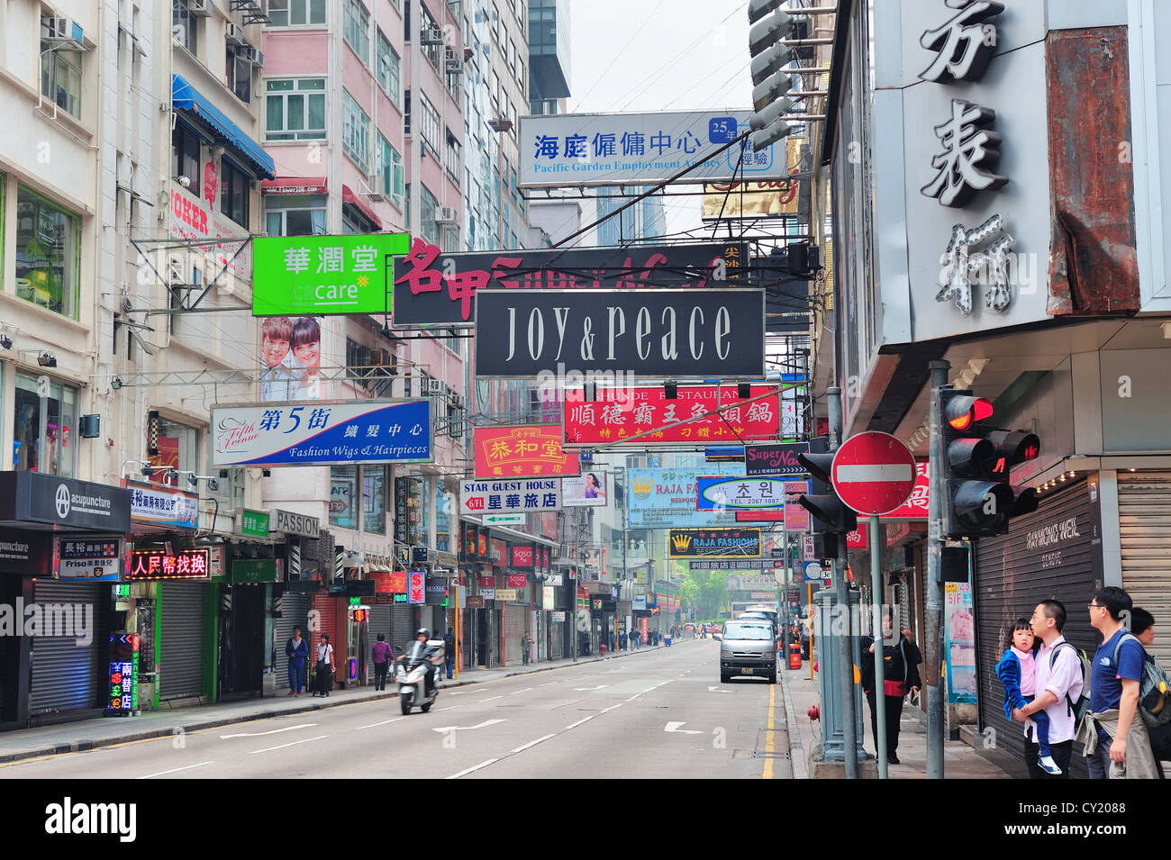 Street view with traffic and shops Stock Photo - Alamy