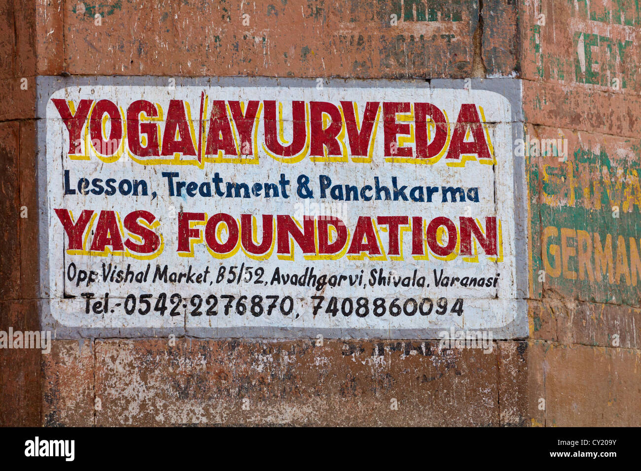 Advertisement Signs on a Wall at the Ghats in Varanasi, India Stock ...