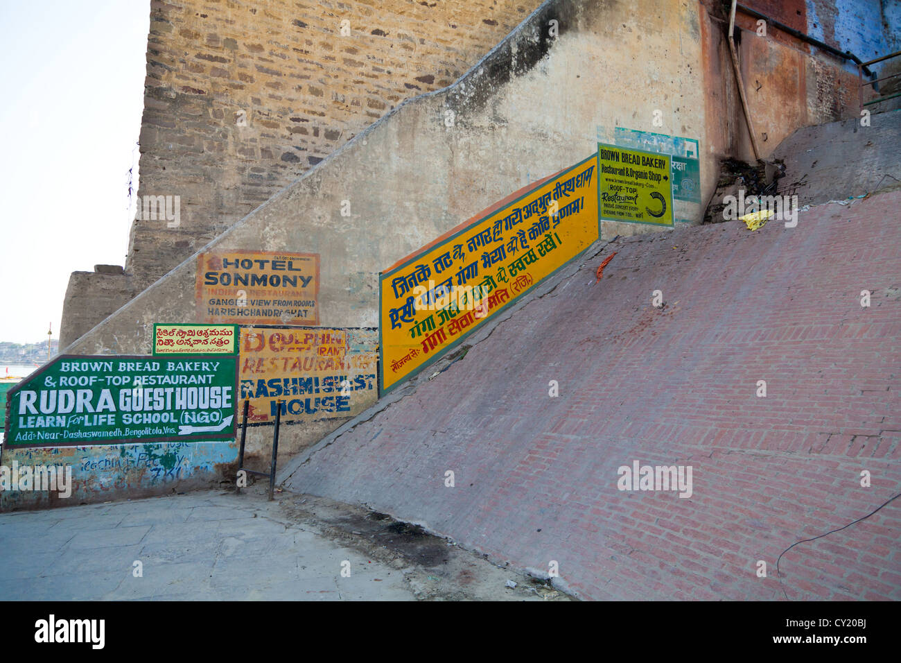 Advertisement Signs on a Wall at the Ghats in Varanasi, India Stock ...