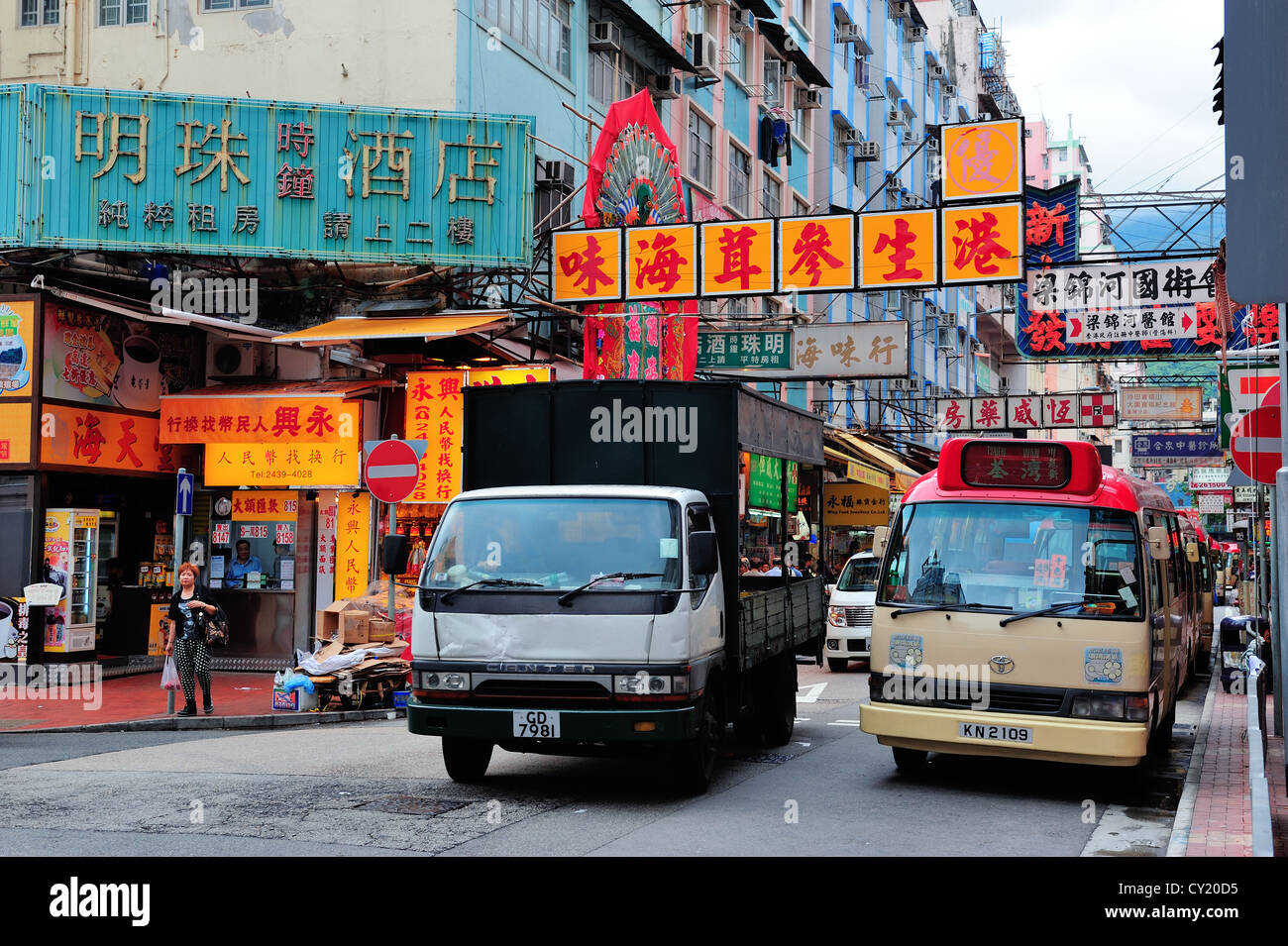 Street view with traffic and shops Stock Photo - Alamy
