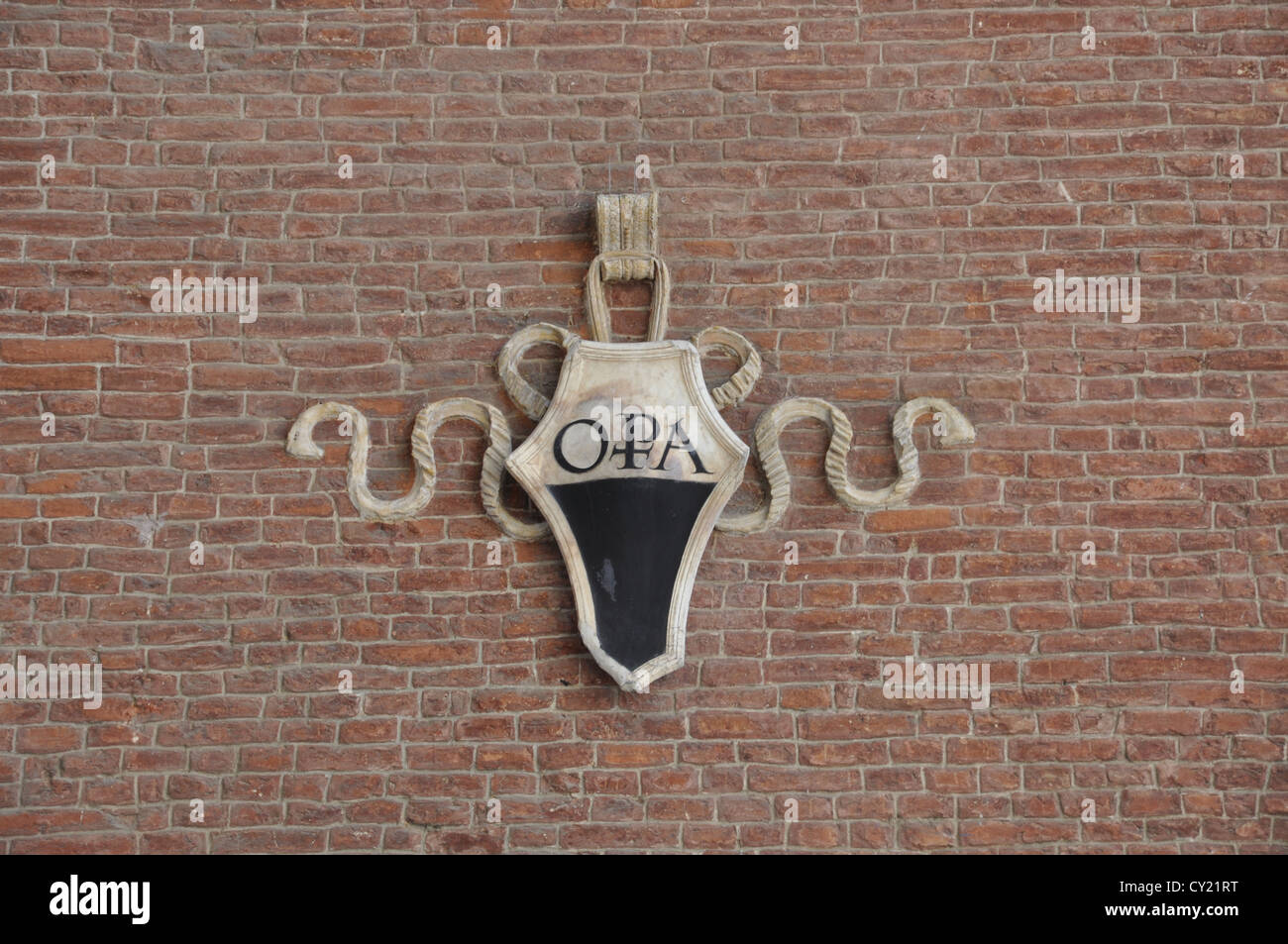 Sienna symbols on the walls of the city Stock Photo - Alamy