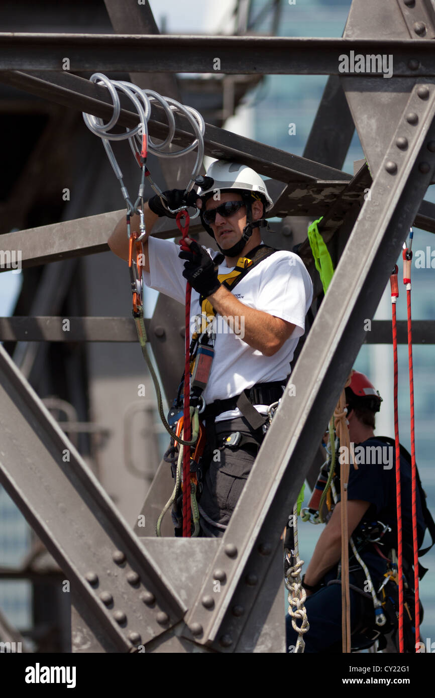 Members of London Fire Brigade practise rope rescue procedures on old ...