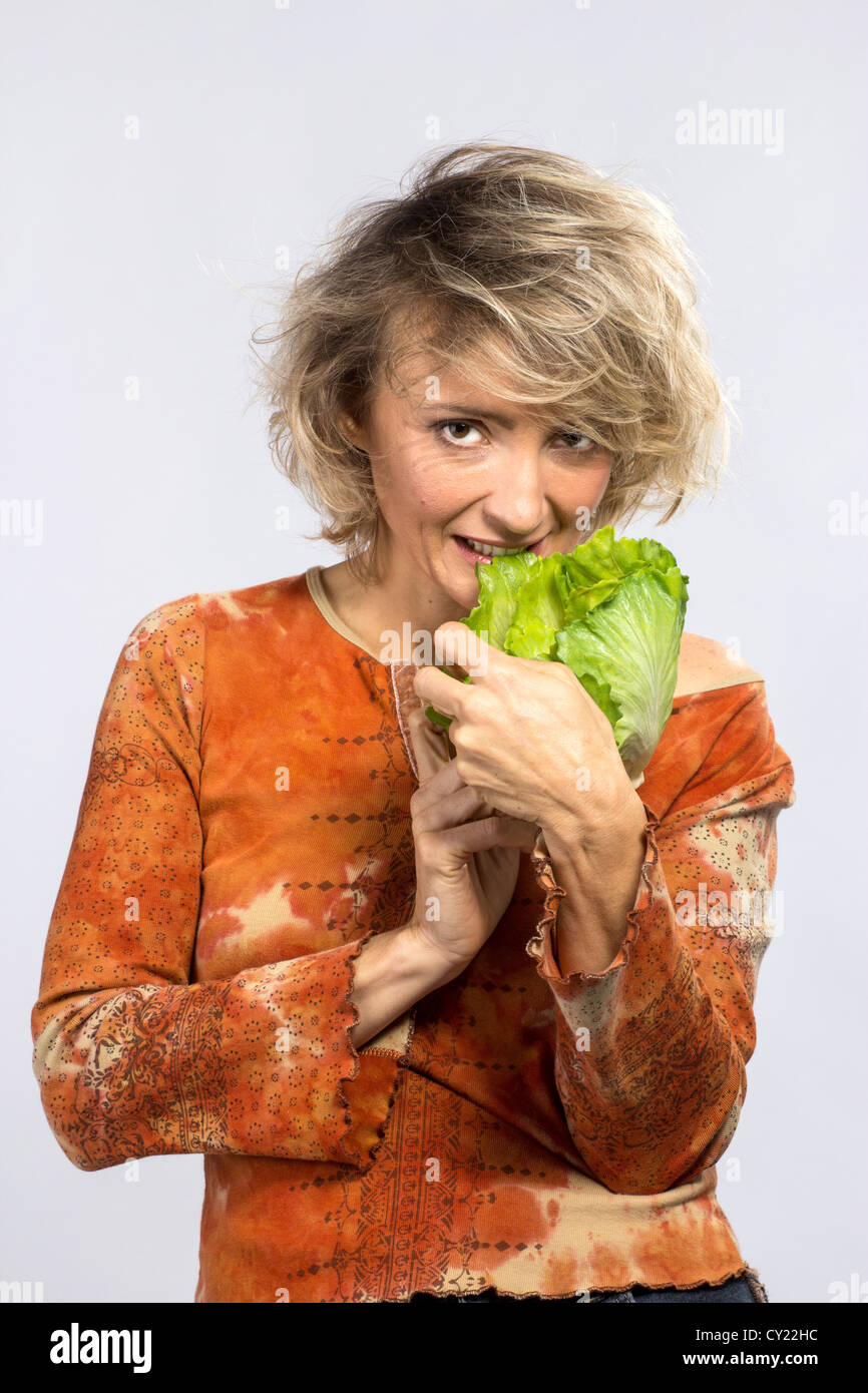 Beautiful woman with green cabbage, isolated on white Stock Photo - Alamy