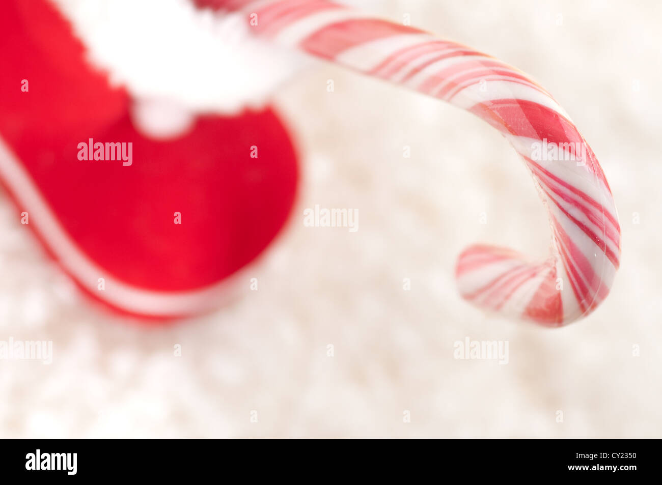 red christmas boot with candy on the snow Stock Photo - Alamy