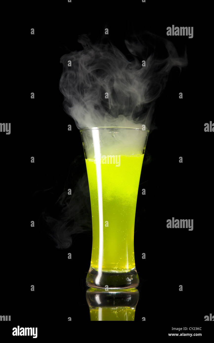 Yellow radioactive smoking alcohol, studio shot Stock Photo - Alamy
