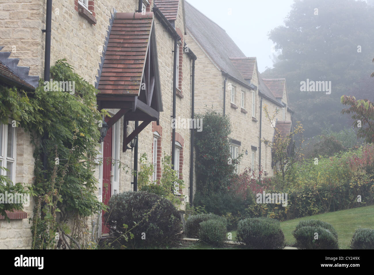House in the mist Stock Photo - Alamy